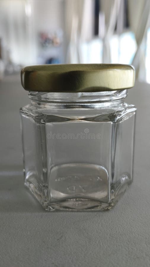 A Small Glass Bottle of Dried Red Chili Pepper for Condiment or ...