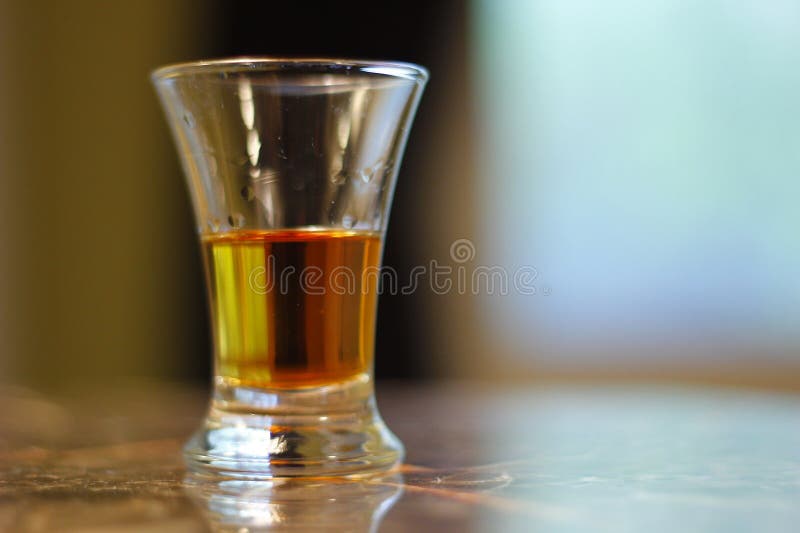 Small Glass of Bourbon Liquor Stock Photo - Image of liquor, glass ...