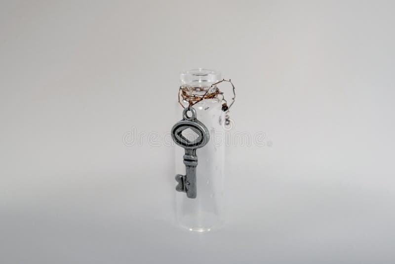 Small Glass Jar with an Attached Key Stock Image - Image of beautiful ...