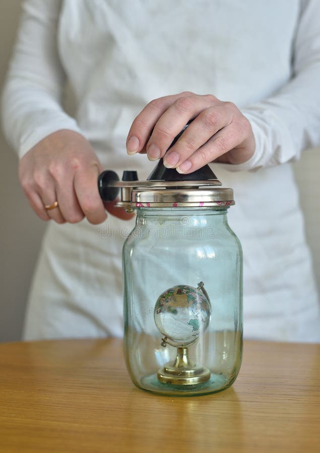 Small globe in a glass jar stock image. Image of business - 186767797
