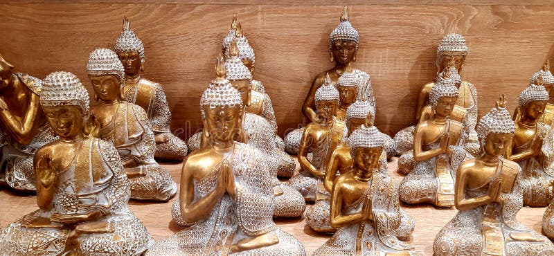 Small Golden Buddhist Statues in a Shop. Stock Photo - Image of thai ...
