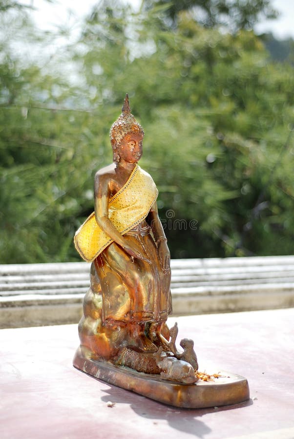 Small Golden Statue of a Buddha on the Sanny Day Stock Image - Image of ...