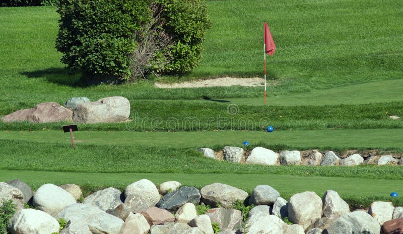 Small Golf Course stock photo. Image of putt, hole, shadow - 1120100