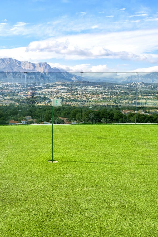 Small Golf Course Amidst Beautiful Scenery with Mountains Stock Image ...