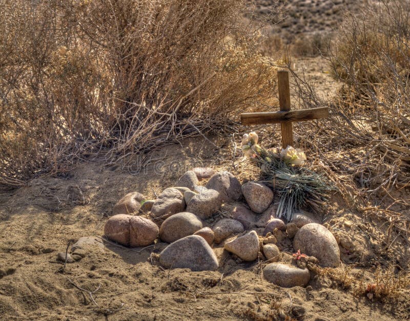 Small grave in the desert stock photo. Image of rocks - 21716606
