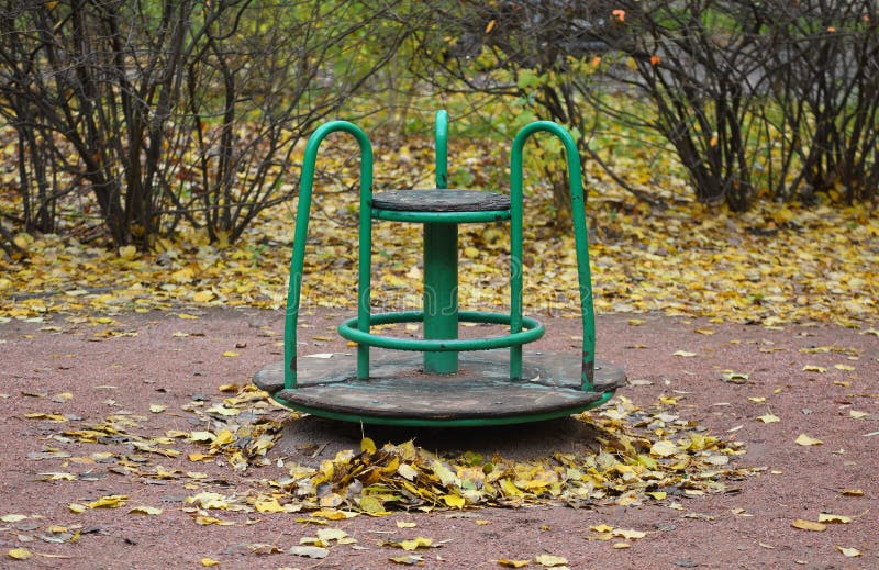 Small Green Carousel on the Playground Stock Photo - Image of wooden ...