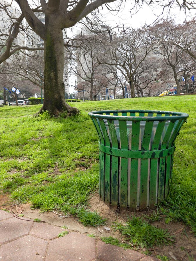 Small Green Modern Trash Bin in the Park Stock Image - Image of plant ...