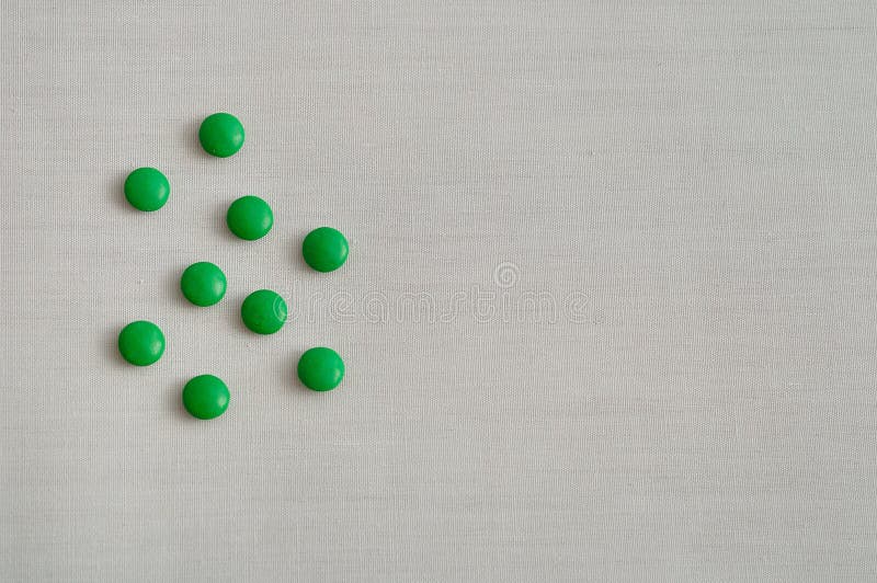 Small Green Pills with a Little Green Pill Bottle Stock Photo - Image ...