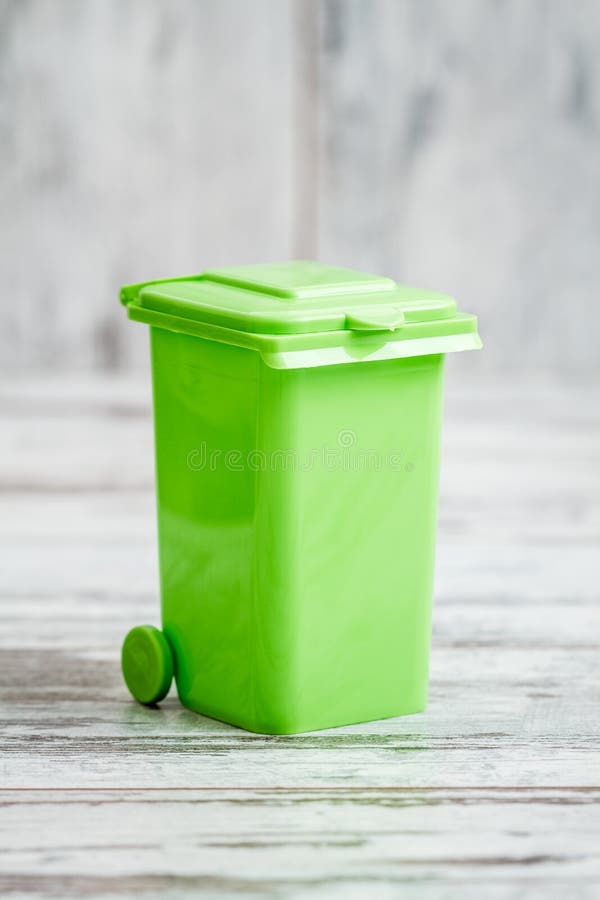 Small Green Plastic Desk Organizer Box with Garbage Container De Stock ...