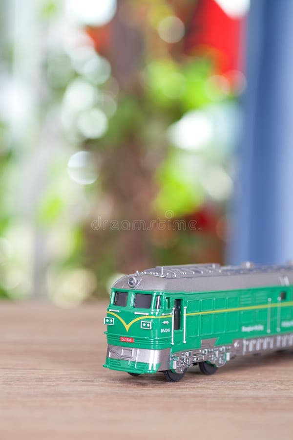 A Small Green Train Model on the Table Stock Image - Image of travel ...