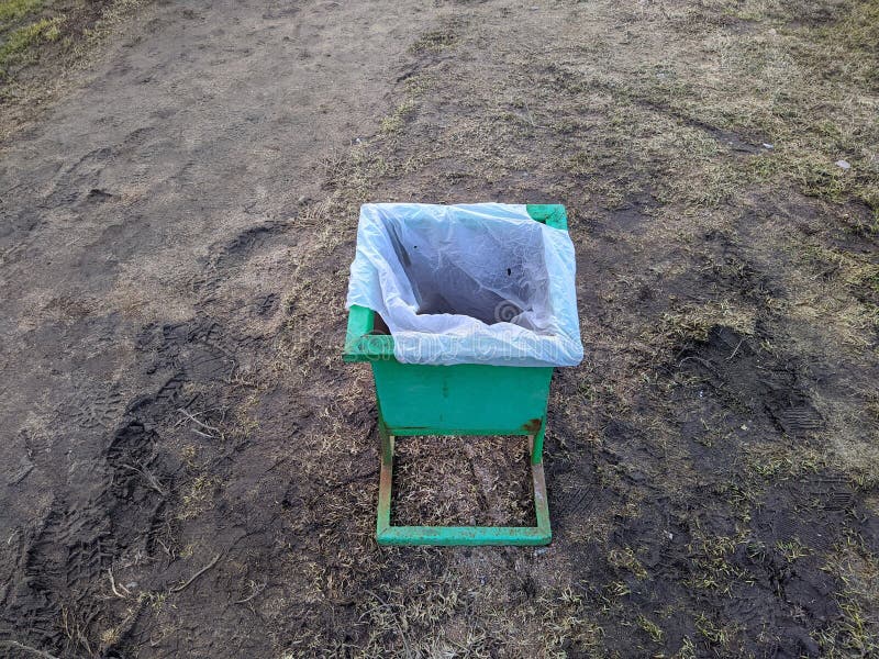 Small and Green Trash Can in the Park Stock Image - Image of plastic ...