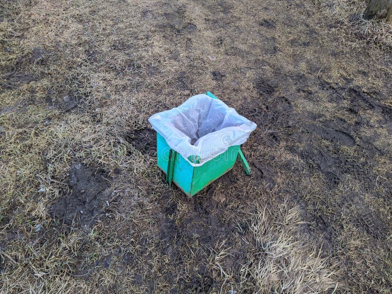 Small and Green Trash Can in the Park Stock Photo - Image of discard ...