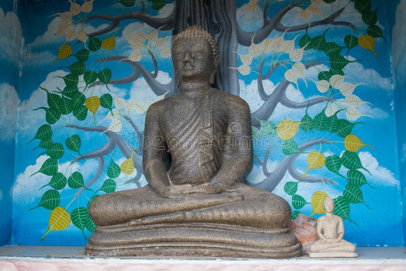 Small Grey Statue of a Buddha Near the Temple Stock Photo - Image of ...