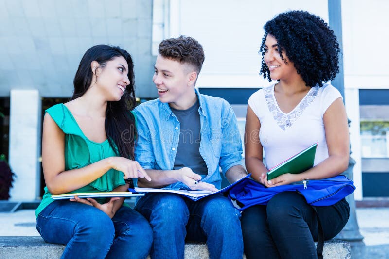 Small Group of International Students Learning Outdoors Stock Image ...