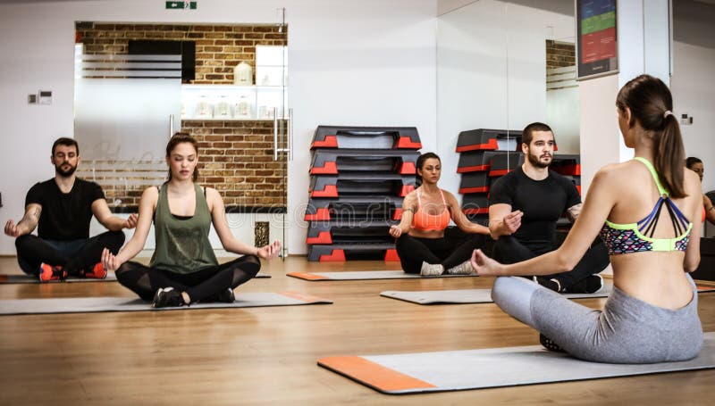 Small Group of People Exercise Yoga. Stock Photo - Image of closed ...