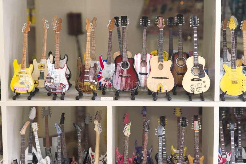 Small guitars editorial stock image. Image of gift, black - 44973774
