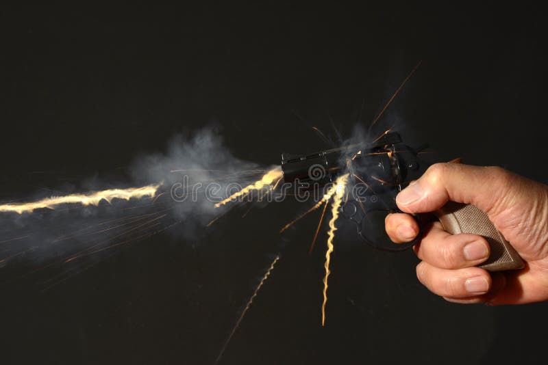 Small Gun being fired stock photo. Image of handgun, flash - 66708626