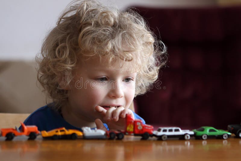 Small handsome boy. stock photo. Image of eyes, curly - 210210558