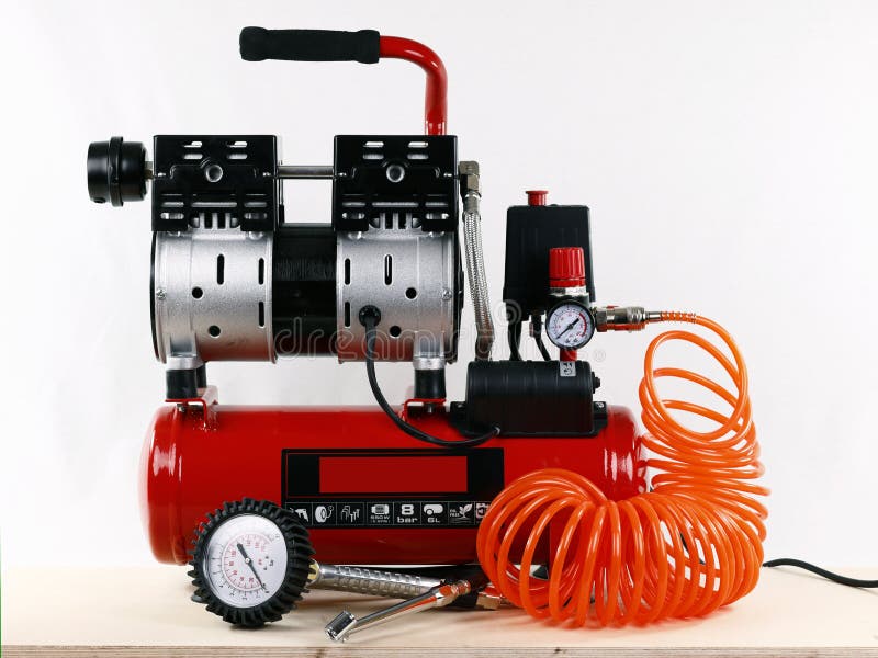A Small, Silent and Handy Compressor with Pressure Hose Stock Photo ...