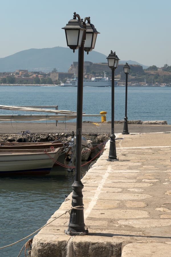 A Row of Lamp Posts with Corfu Town in the Background Corfu Stock Photo ...