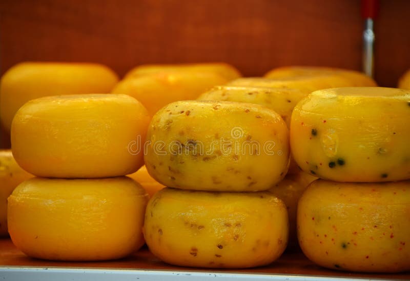 Small Heads of Hard Cheese on Retail Display Stock Photo - Image of ...