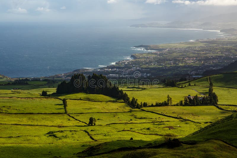 Small Hills Covered with a Fresh Green Fields and Meadows, Falling To ...