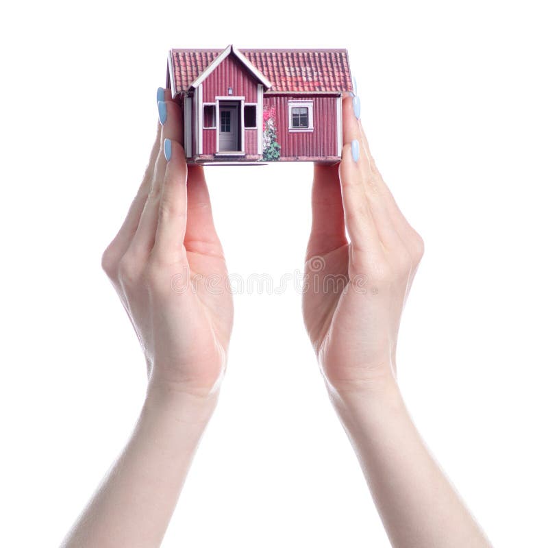 Small house in hand stock photo. Image of model, build - 146812502