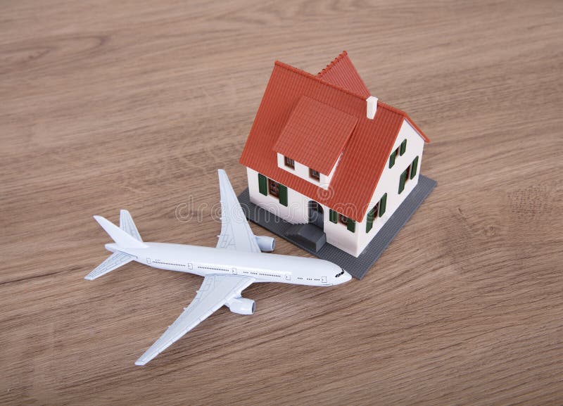Small House Model and Small Airplane Model on the Table Stock Photo ...