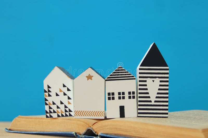 Small House Model Over Open Book. Selective Focus Stock Photo - Image ...