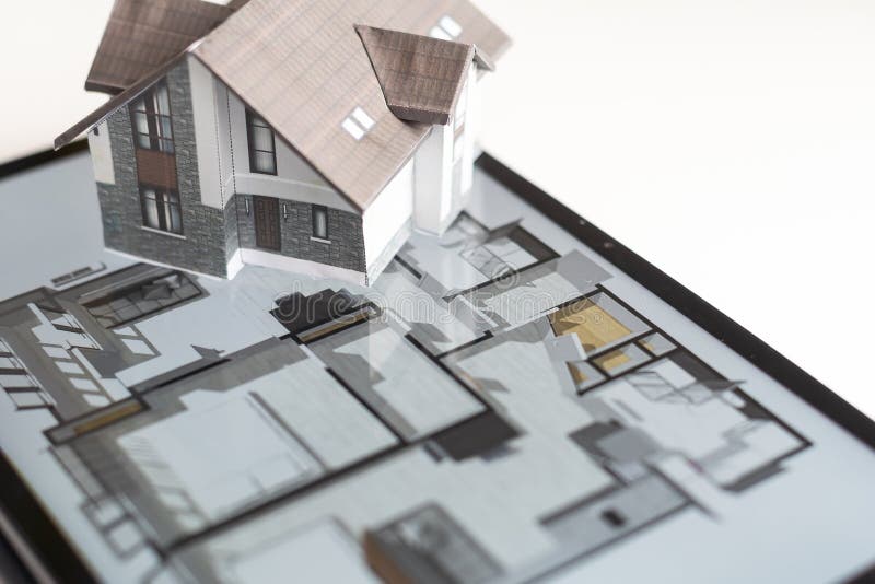 Small House Model is on Screen Tablet and Icons Home Electronics ...