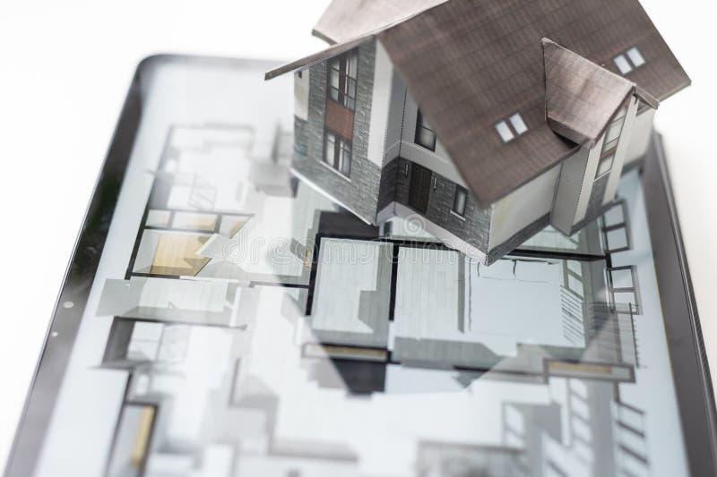 Small House Model is on Screen Tablet and Icons Home Electronics ...
