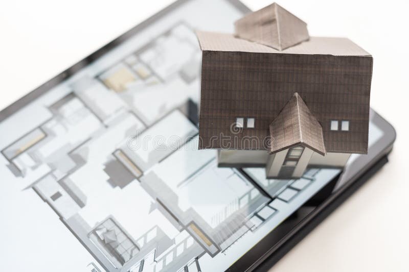 Small House Model is on Table and Icons Home Electronics Devices ...