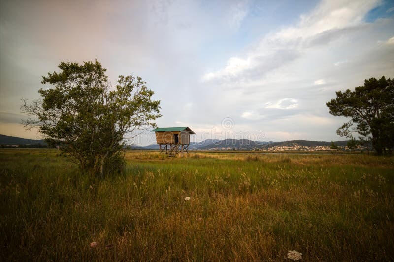 Small Hut in the Valley in a Rural Area at Sunset Stock Photo - Image ...