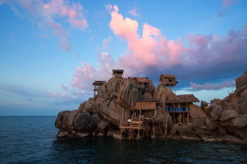 Small Huts on the Rock Island Stock Image - Image of ocean, palm: 95422231