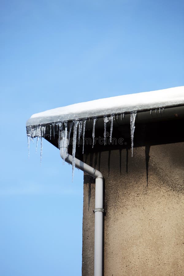 Small Icicles Hanging from the Eaves of a House Stock Image - Image of ...