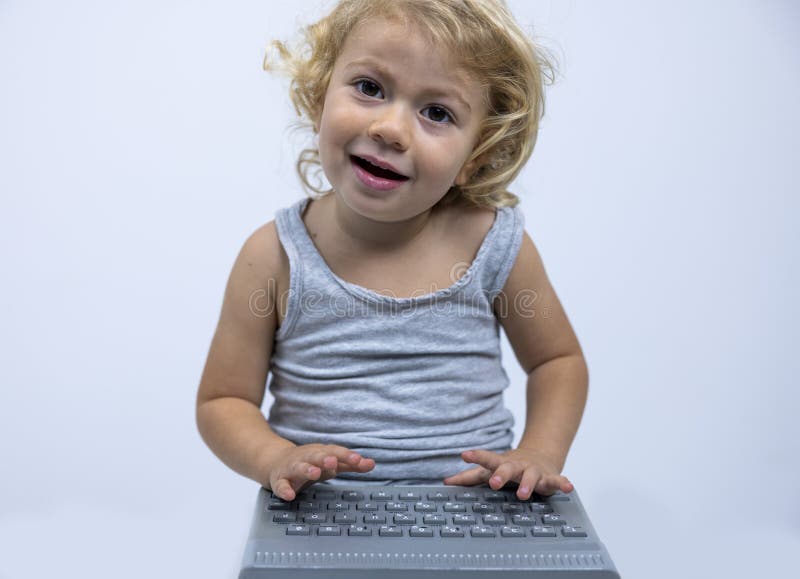Small Girl Typing on Keyboard Stock Photo - Image of baby, keyboard ...