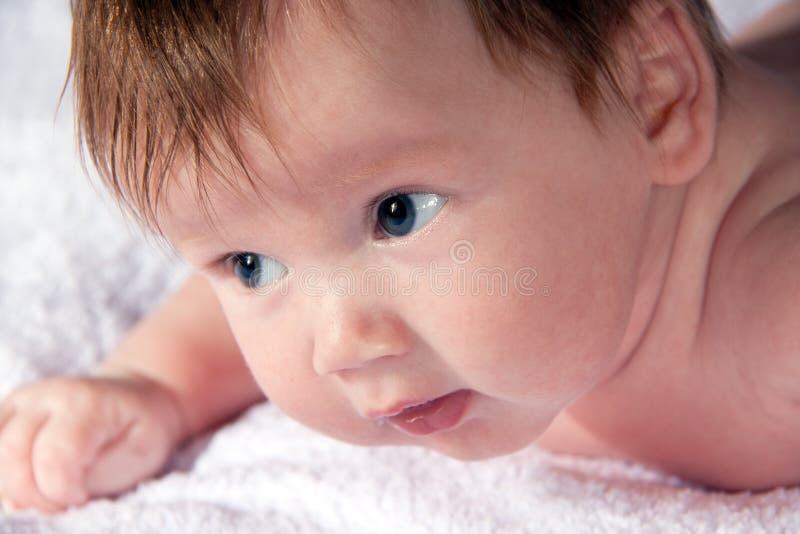 Small Infant Try To Raise Head Stock Image - Image of peacefulness ...