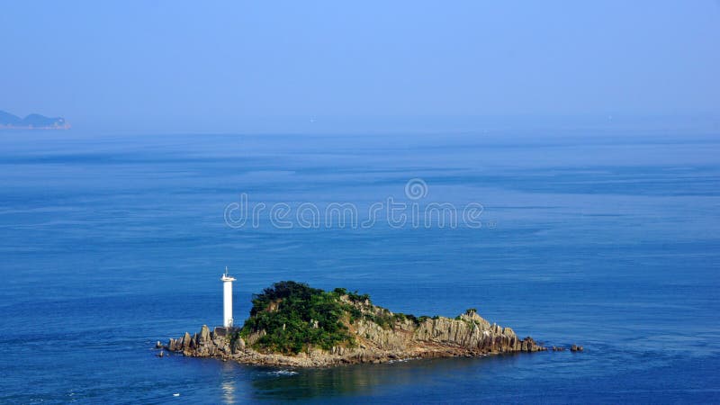 Small Island with Lighthouse Next To Onaruto Bridge in Japan Stock ...