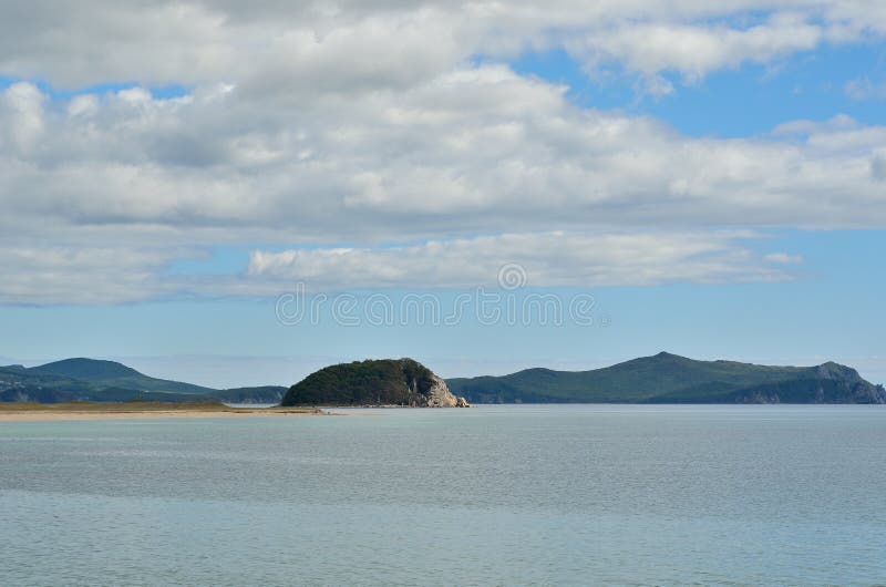 Small island in sea 2 stock image. Image of small, outdoors - 33596025