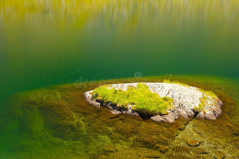Small Island in Very Clean Water of a Glacier Lake Stock Image - Image ...