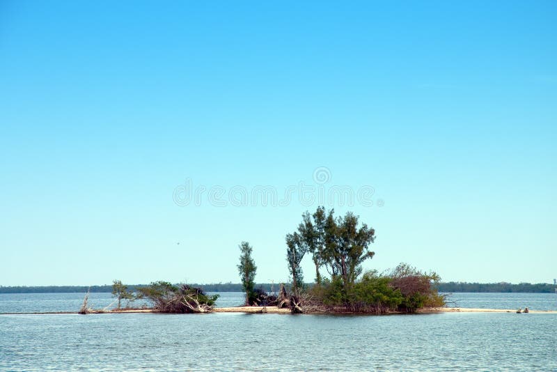 Small island in water stock photo. Image of water, coastal - 708890