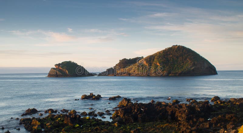 Small Islet Near Coastline stock image. Image of idyllic - 115619257