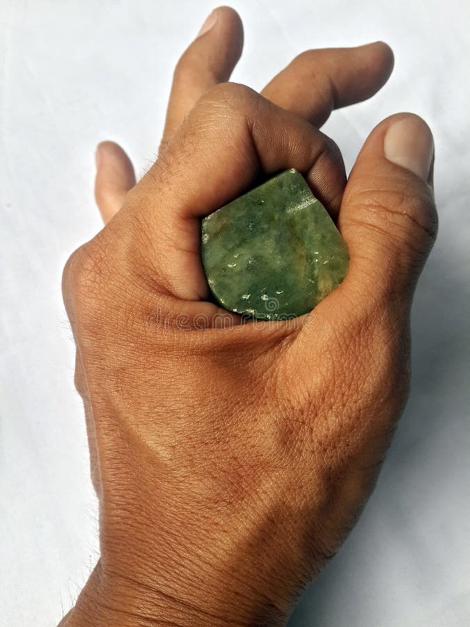 Small jade in hand stock photo. Image of hand, produce - 224345120