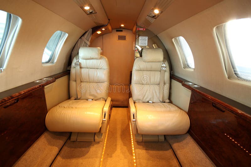 Small jet cabin stock image. Image of plane, sign, table - 22010197