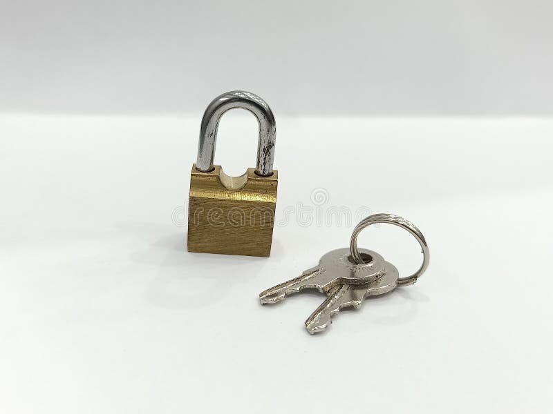 Small Key but at Least Useless Stock Image - Image of padlock, white ...