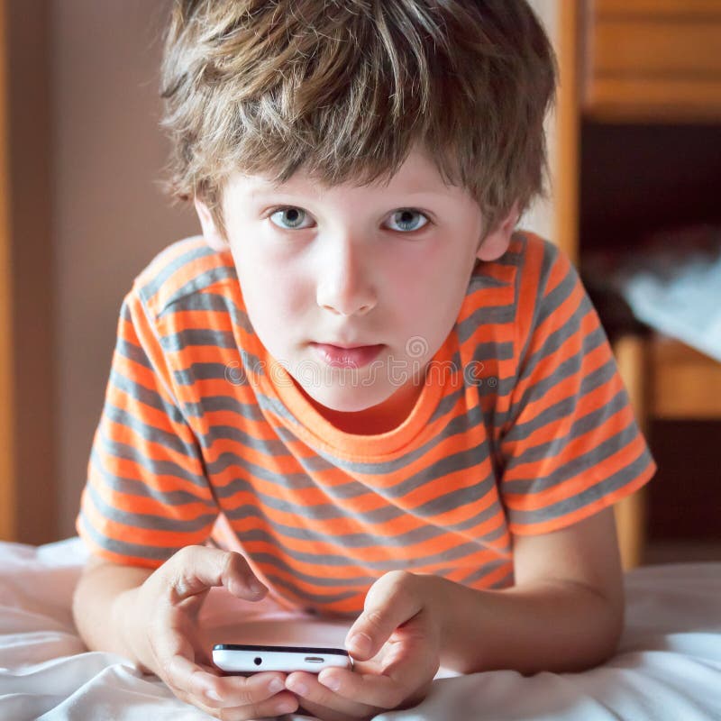 Small Kid Playing on a Smartphone Stock Photo - Image of childhood ...