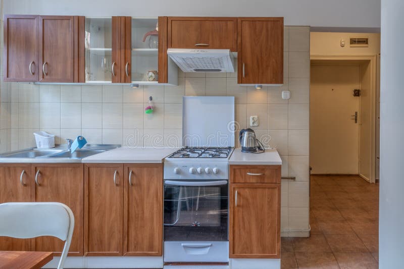 A Small Kitchen in a Small Apartment. Stock Image - Image of fridge ...
