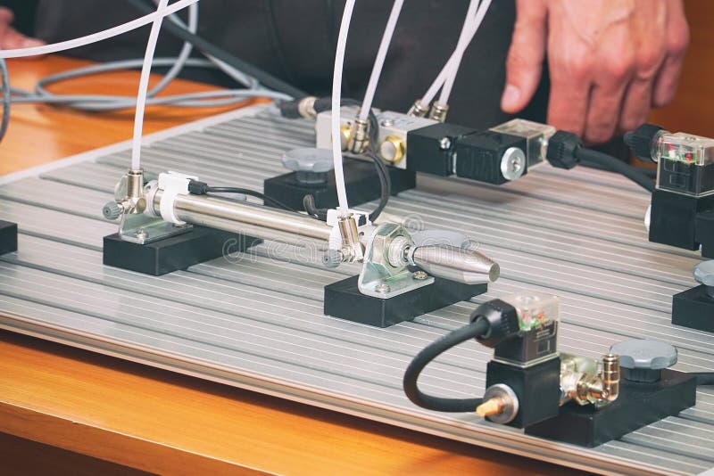 Engineers Connect Wires Control Panel with Small Test Bench for ...