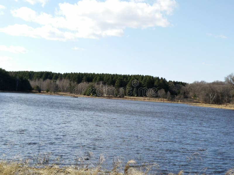 Small Lake Sandy stock image. Image of trees, water, peaceful - 52614905