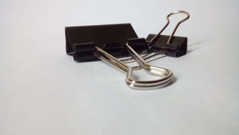 Small and Large Black Binder Clips Stock Image - Image of bussines ...